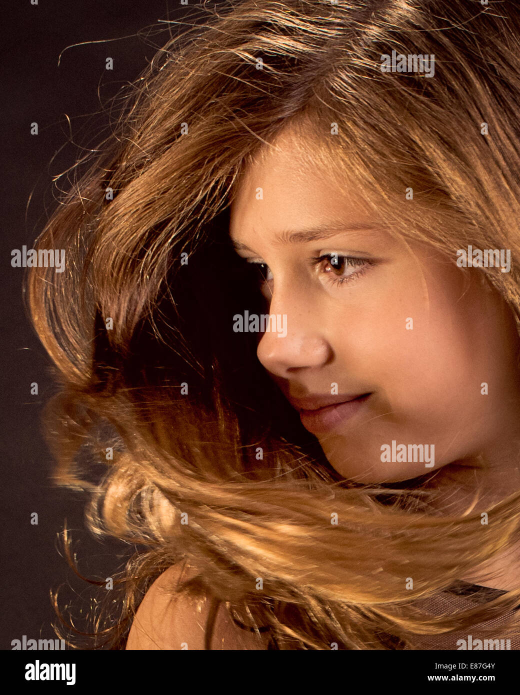 Young Girl Models In Studio In Various Costumes And Poses Stock Photo Young Girl Models In Studio In Various Costumes And Poses Stock Photo