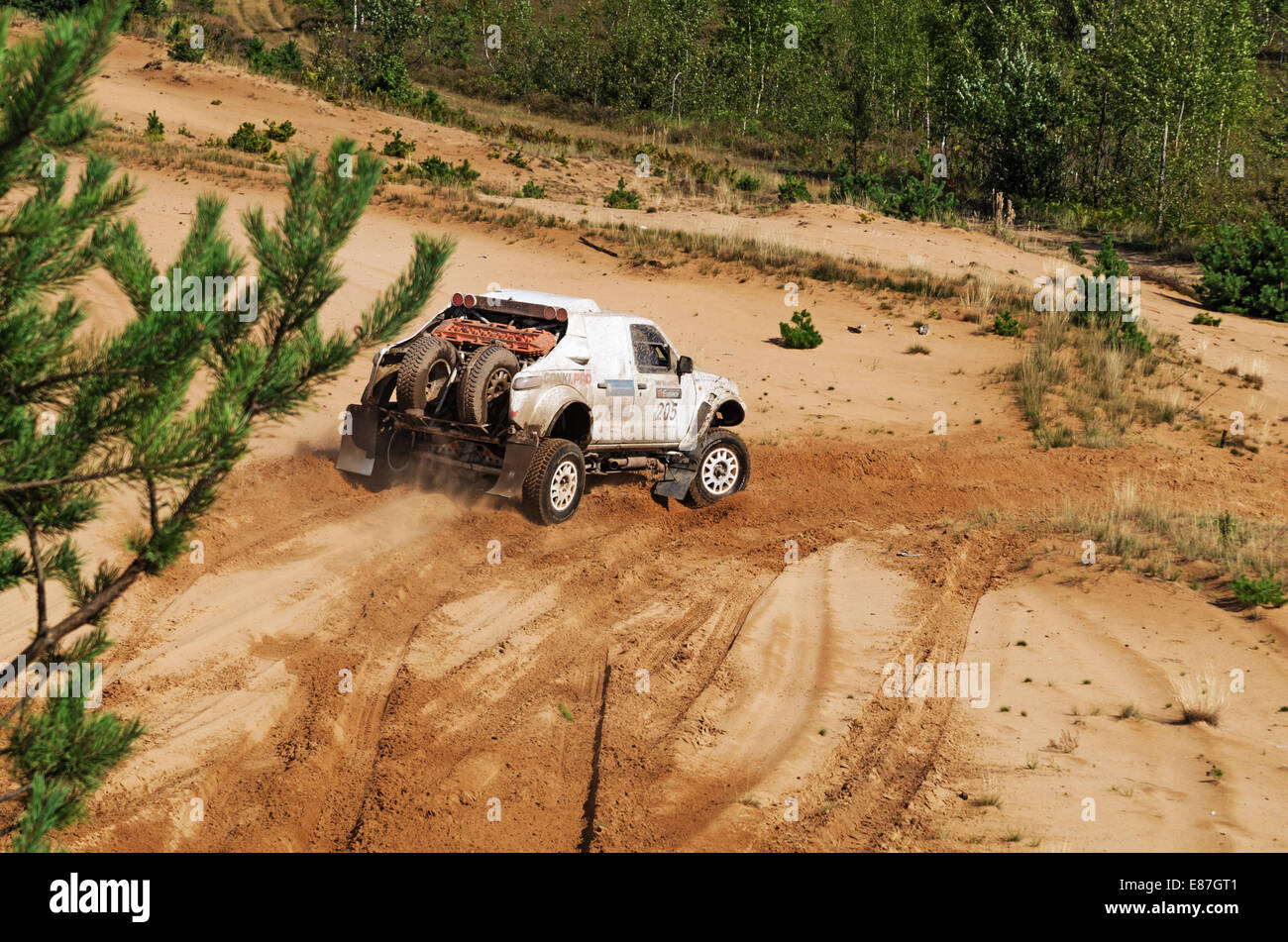Races on a rally-raid on sandy dunes Stock Photo - Alamy