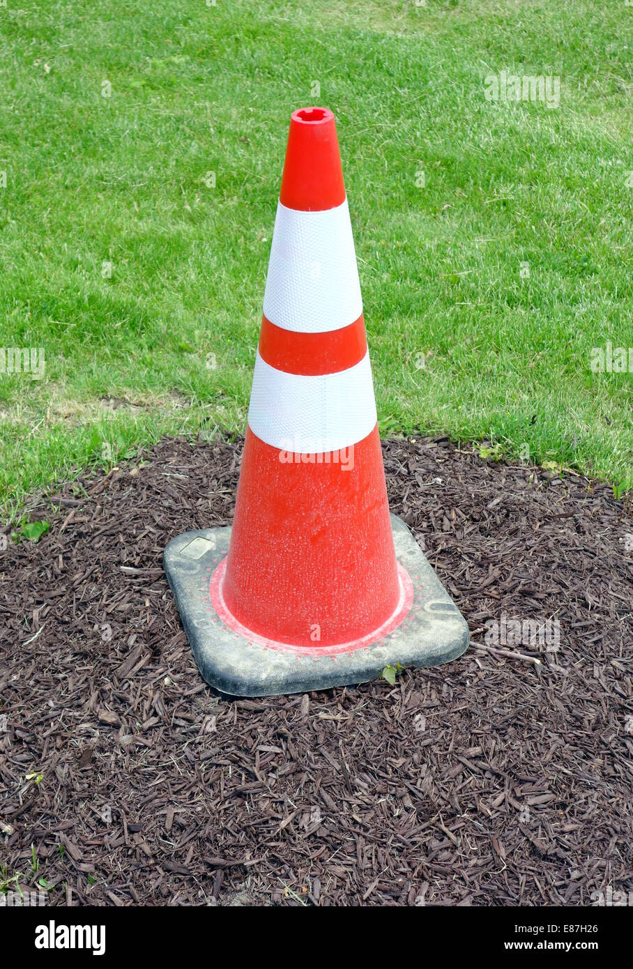 Orange and white construction area cone Stock Photo - Alamy