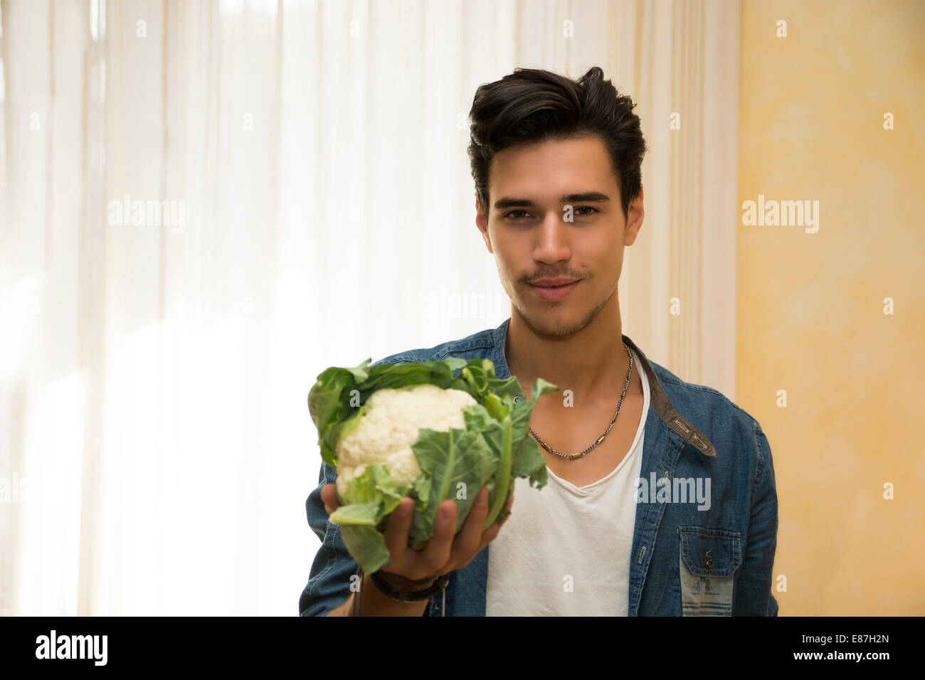 Kitchen looking man young man male white male hi-res stock photography ...