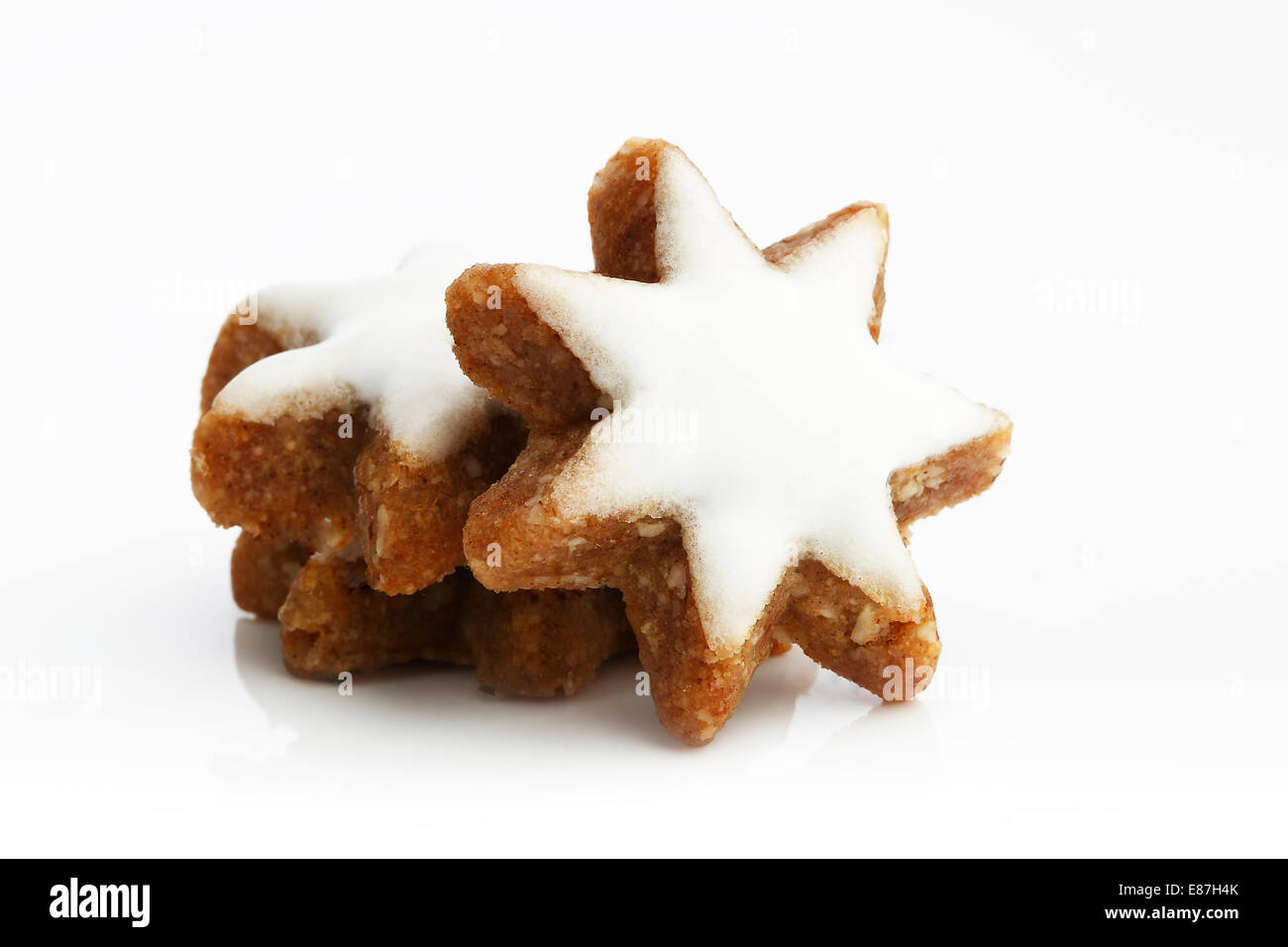 Cinnamon stars in front of a white background Stock Photo - Alamy