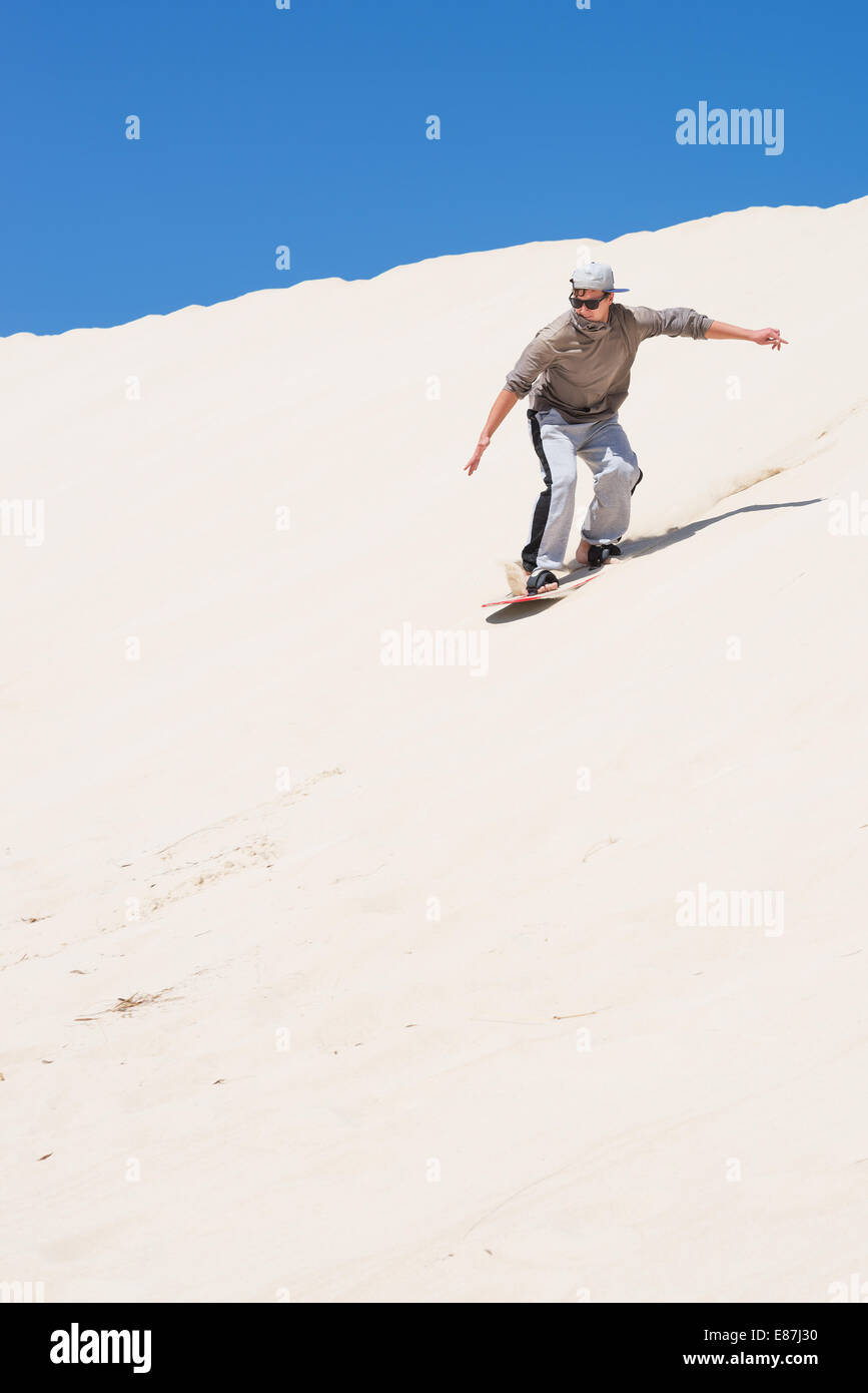 Sandboarding at sand dunes in Little Sahara, Kangaroo Island, South ...