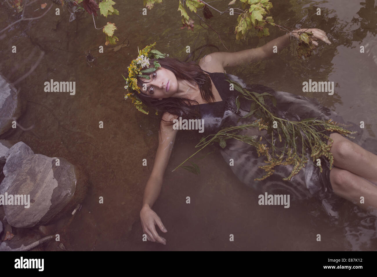 Young beautiful woman in river Stock Photo - Alamy