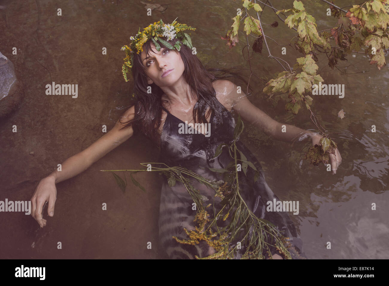 Young beautiful woman in river Stock Photo - Alamy