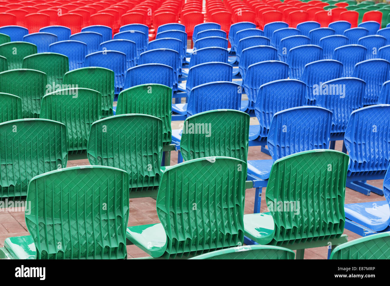 Color chairs on the street Stock Photo - Alamy