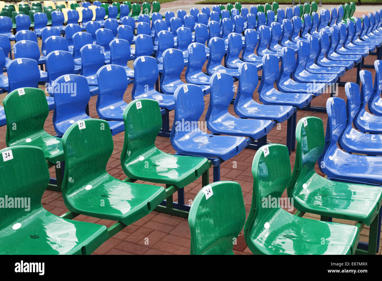 Row blue plastic chairs hi-res stock photography and images - Alamy