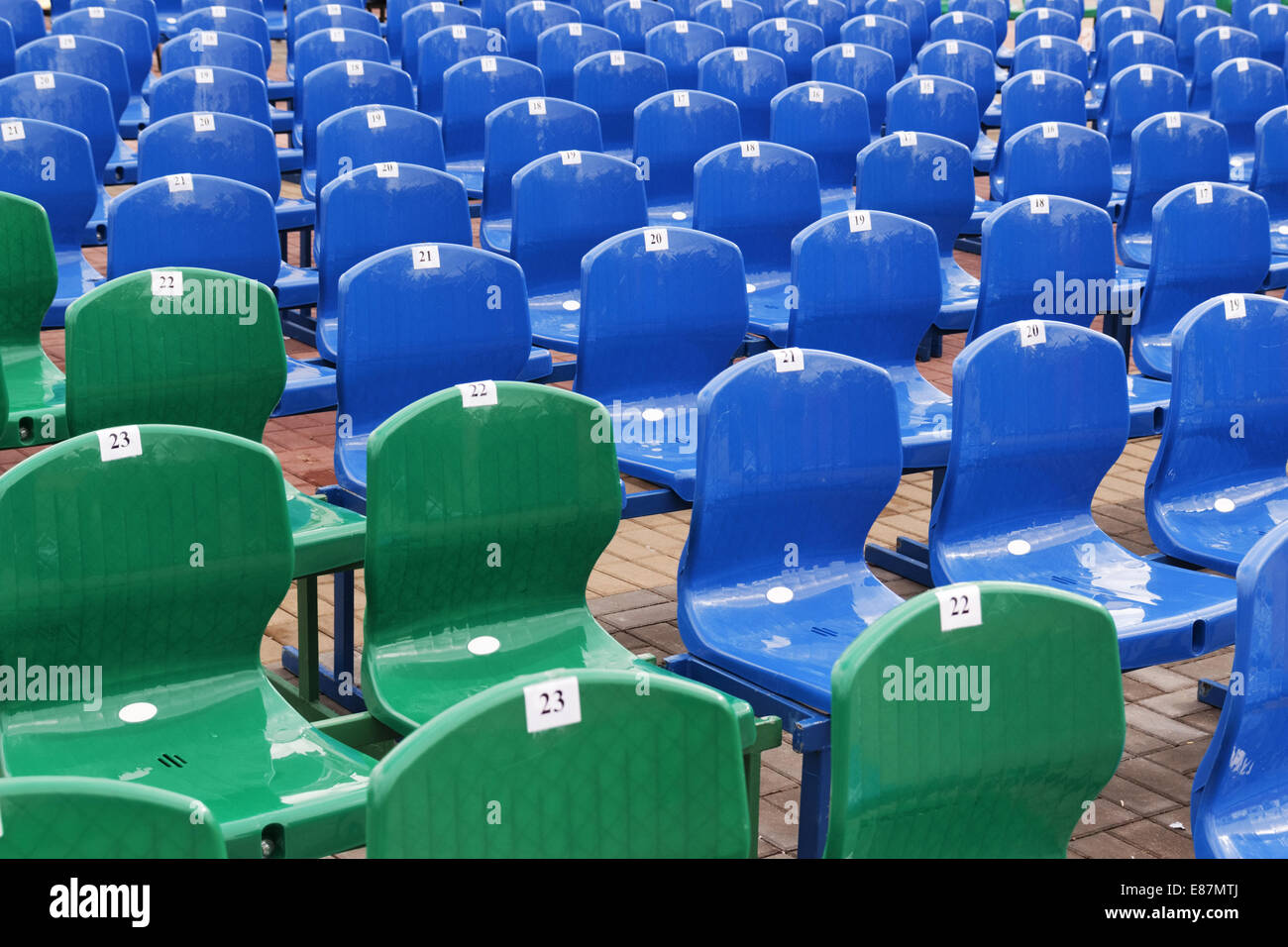 Color chairs on the street Stock Photo - Alamy
