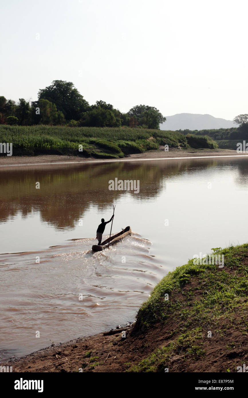 A fisherman fishing in Omo River where the Gibe III is located. Gibe ...