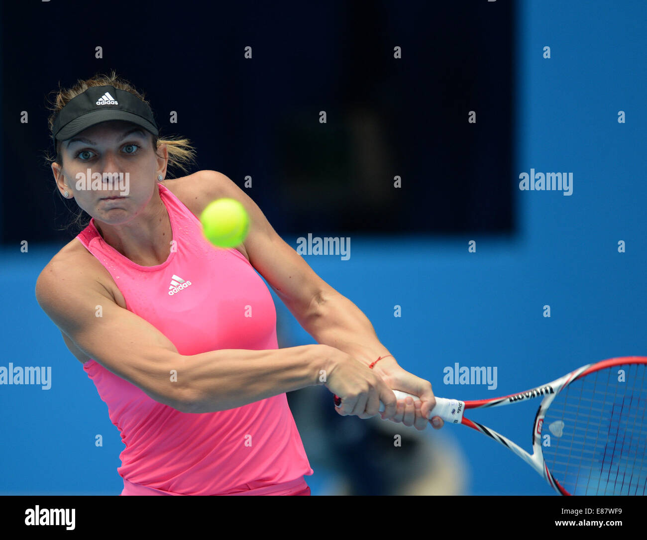 Beijing, China. 2nd Oct, 2014. Romania's Simona Halep returns the ball ...