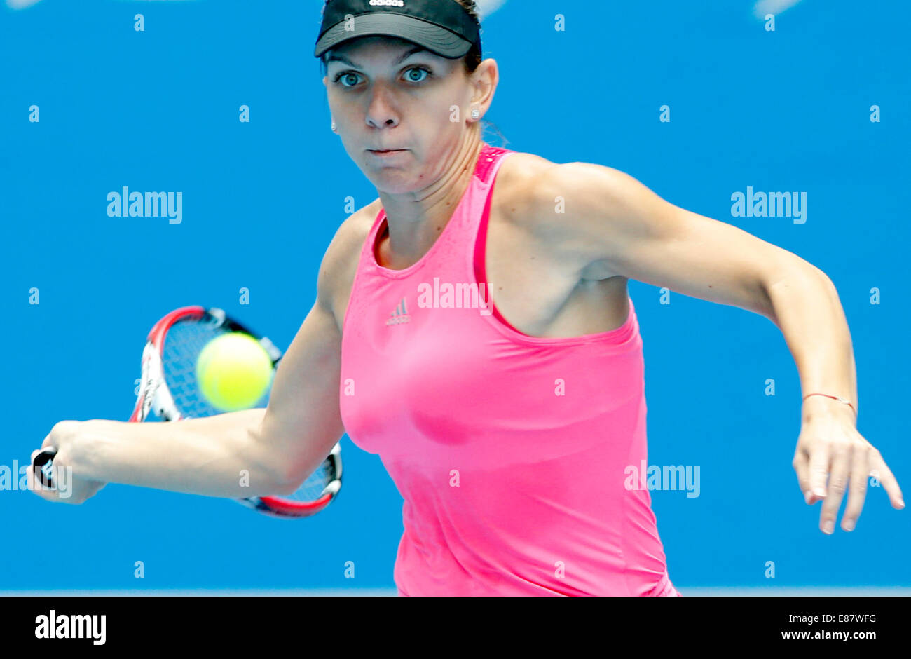 Beijing, China. 2nd Oct, 2014. Romania's Simona Halep returns a hit ...