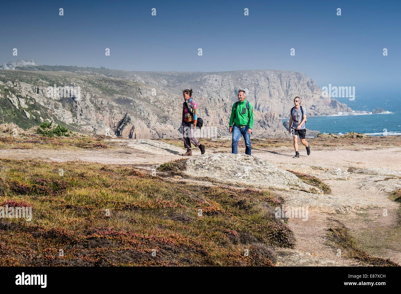 Holidaymakers walking along the South-West Coastal Path near Gwennap ...