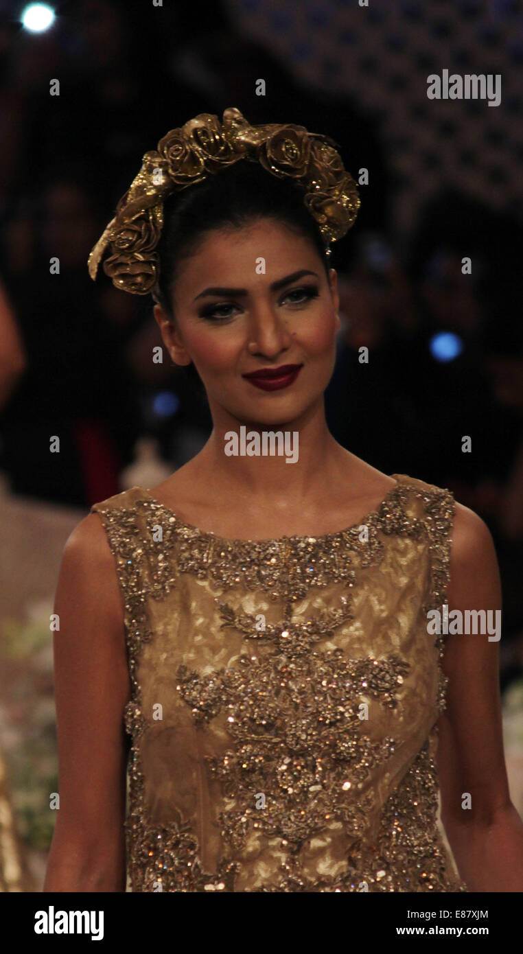 Lahore, Pakistan. 30th Sept, 2014. Models present the creation of ...