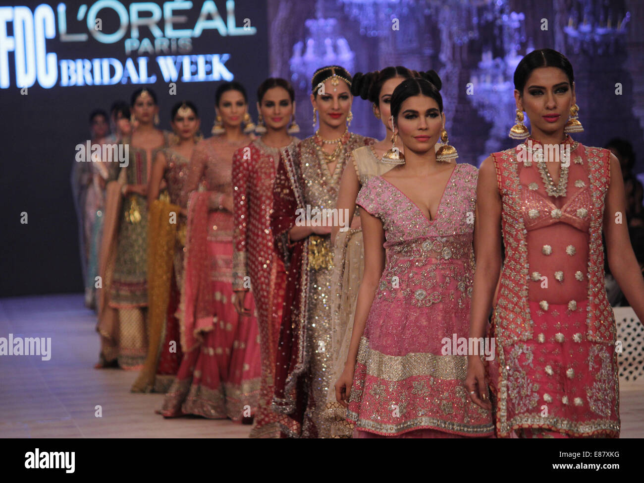 Lahore, Pakistan. 30th Sept, 2014. Models present the creation of ...