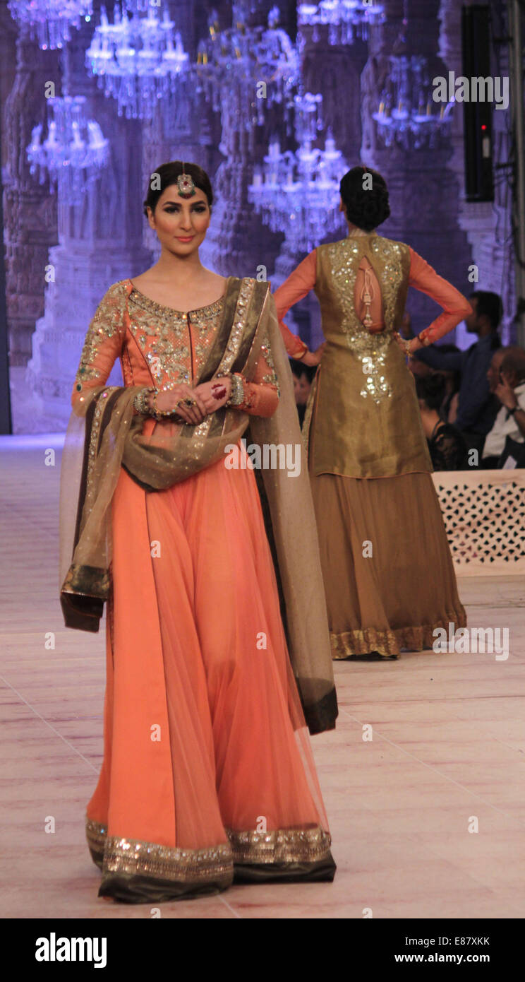 Lahore, Pakistan. 30th Sept, 2014. Models present the creation of ...