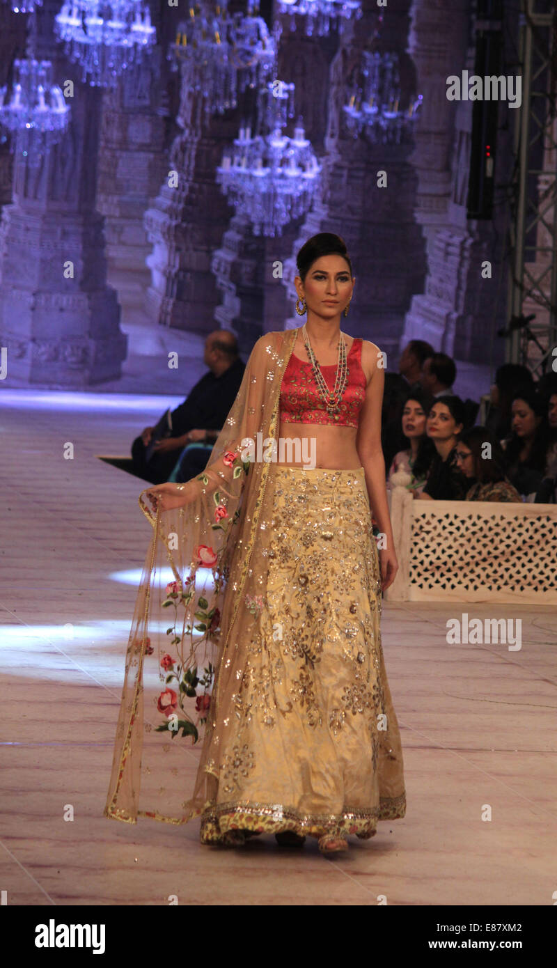 Lahore, Pakistan. 30th Sept, 2014. Models present the creation of ...