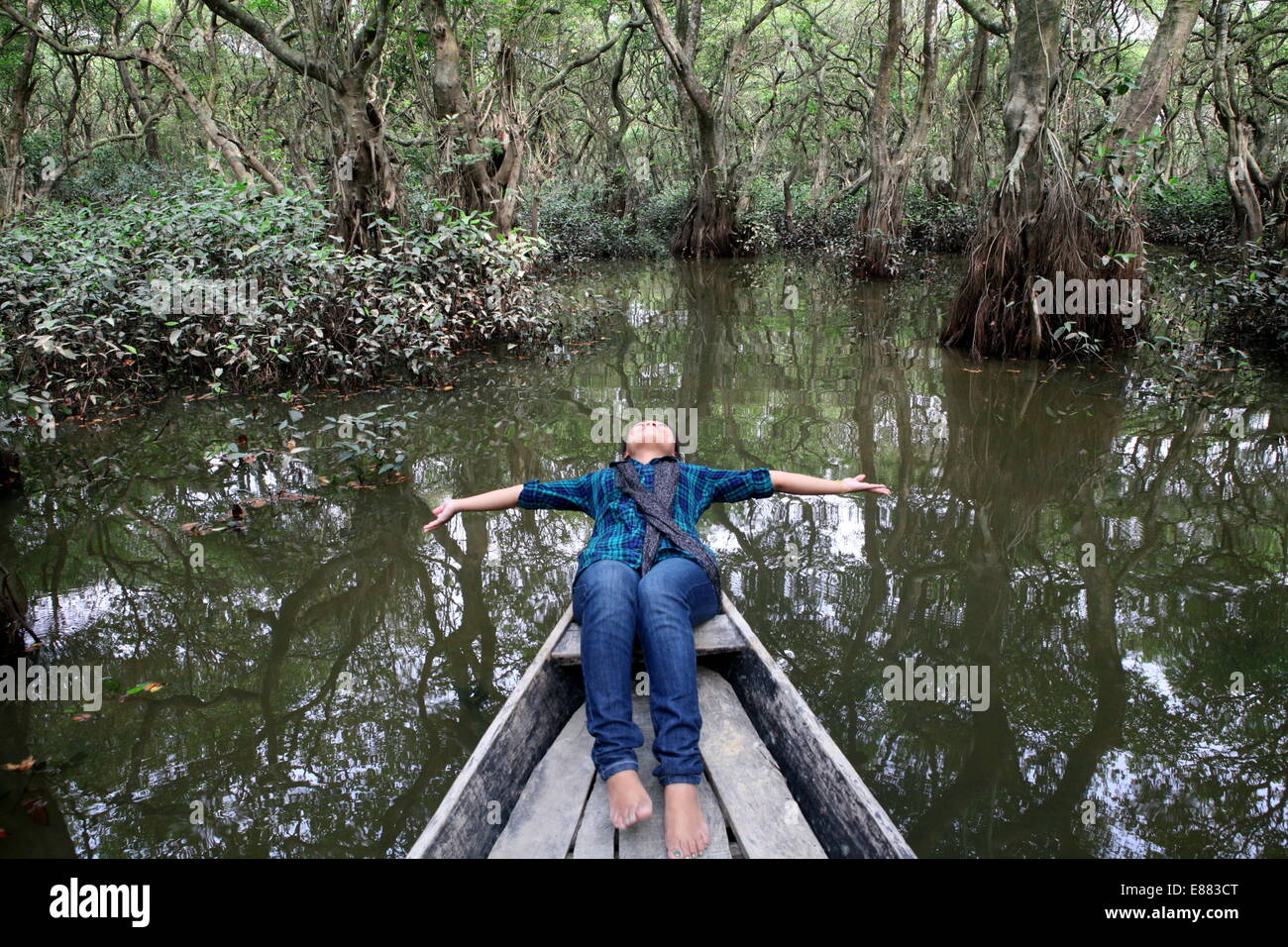 The tourist enjoying the scenery of Ratargul Natural Swamp Forest ...