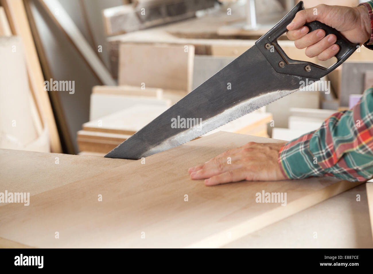 Carpentry workshop worker cutting wooden hi-res stock photography and ...