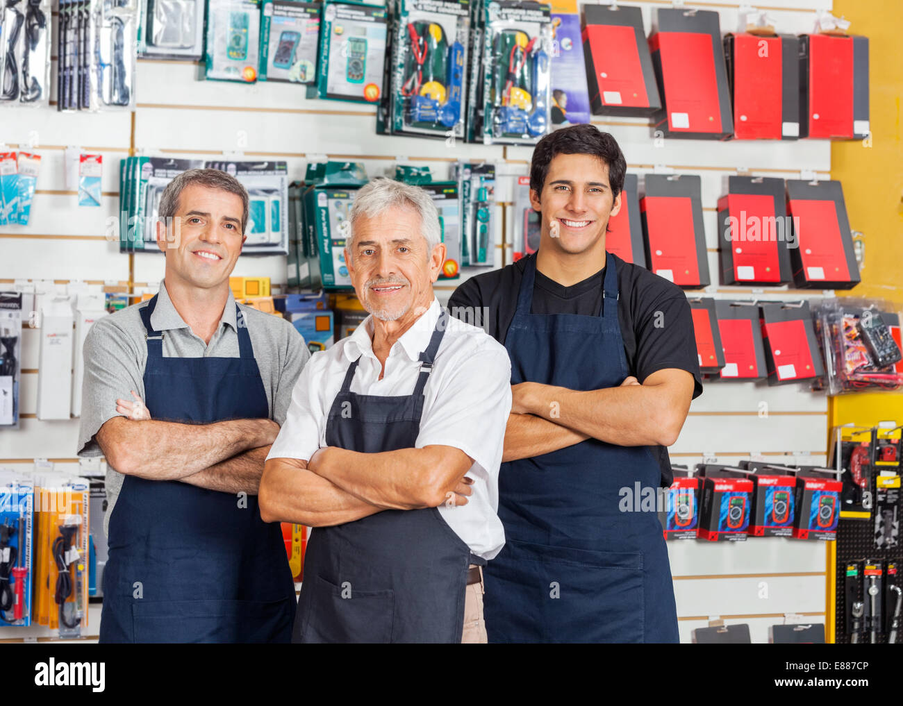 Young salesman arms crossed hi-res stock photography and images - Alamy
