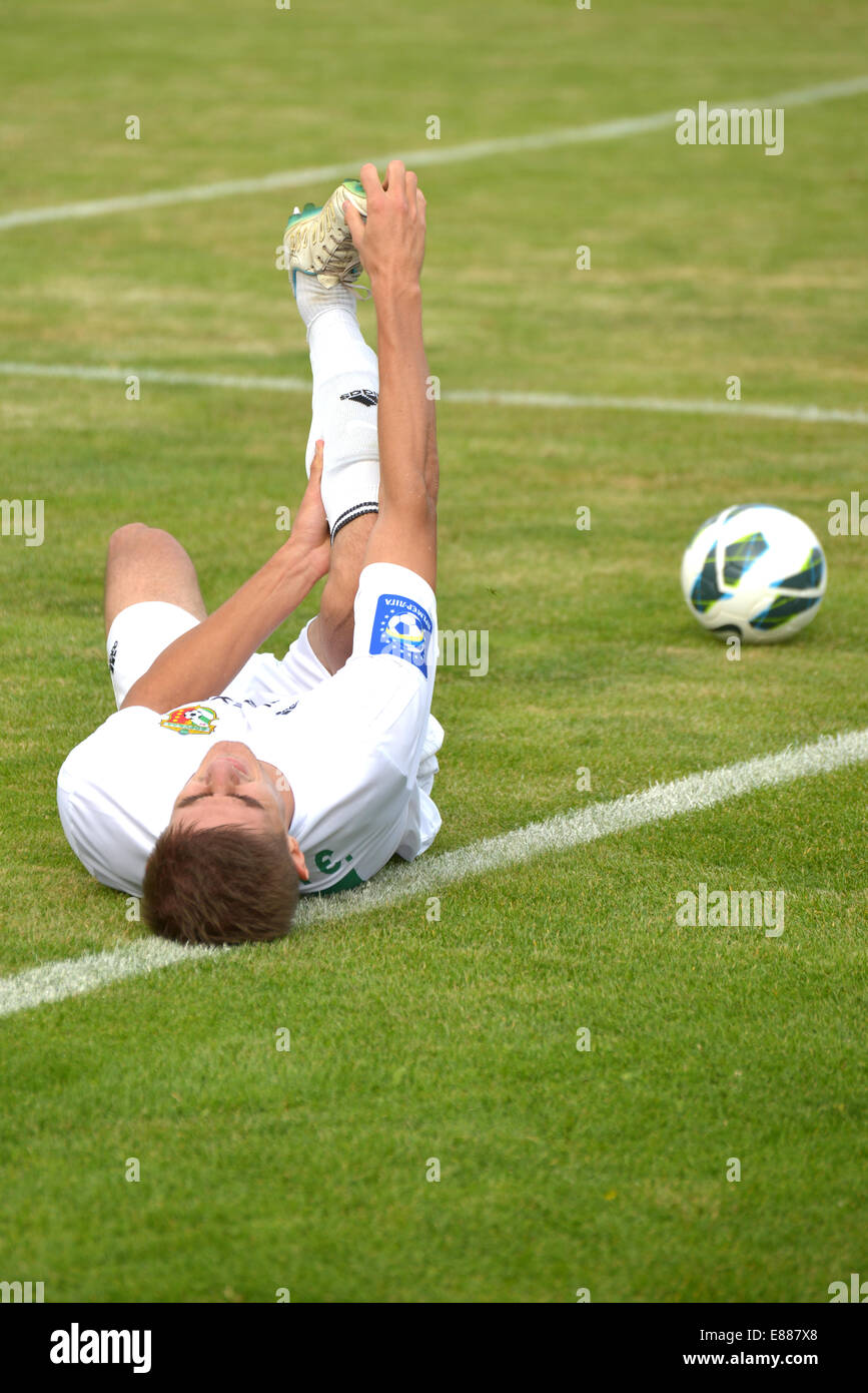 Injured soccer player with coach hi-res stock photography and images ...