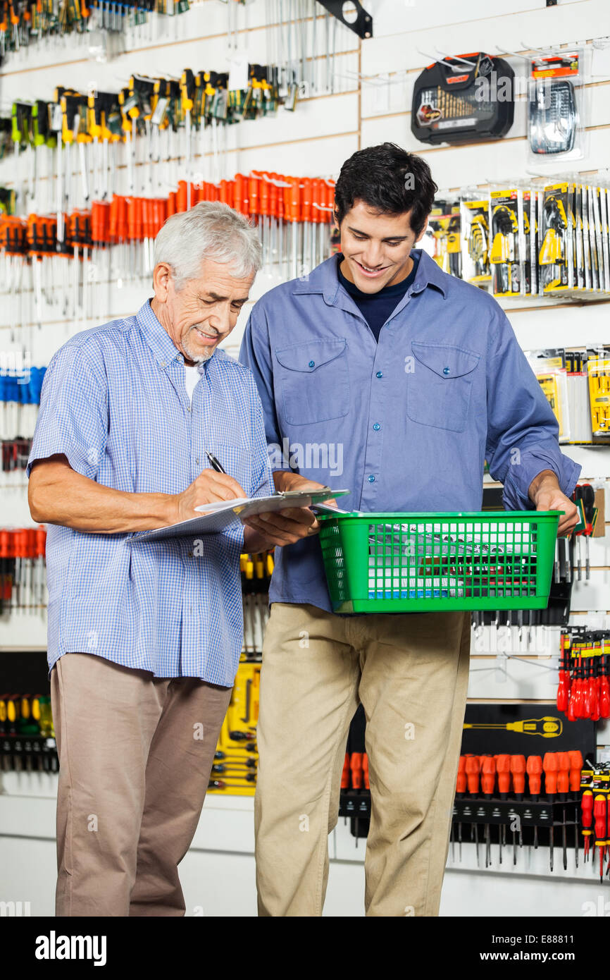 Father And Son Buying Tools In Hardware Store Stock Photo - Alamy