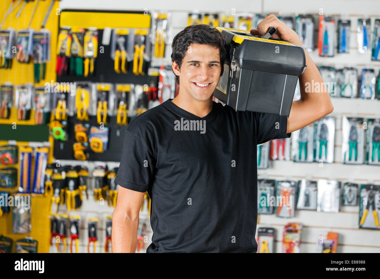 Man carrying tool box on hi-res stock photography and images - Alamy
