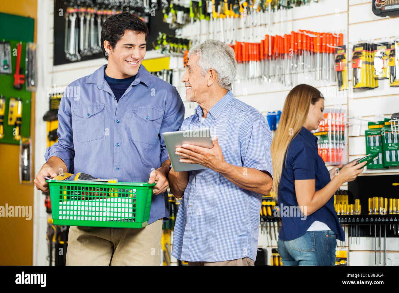 Father And Son Buying Tools In Hardware Store Stock Photo - Alamy