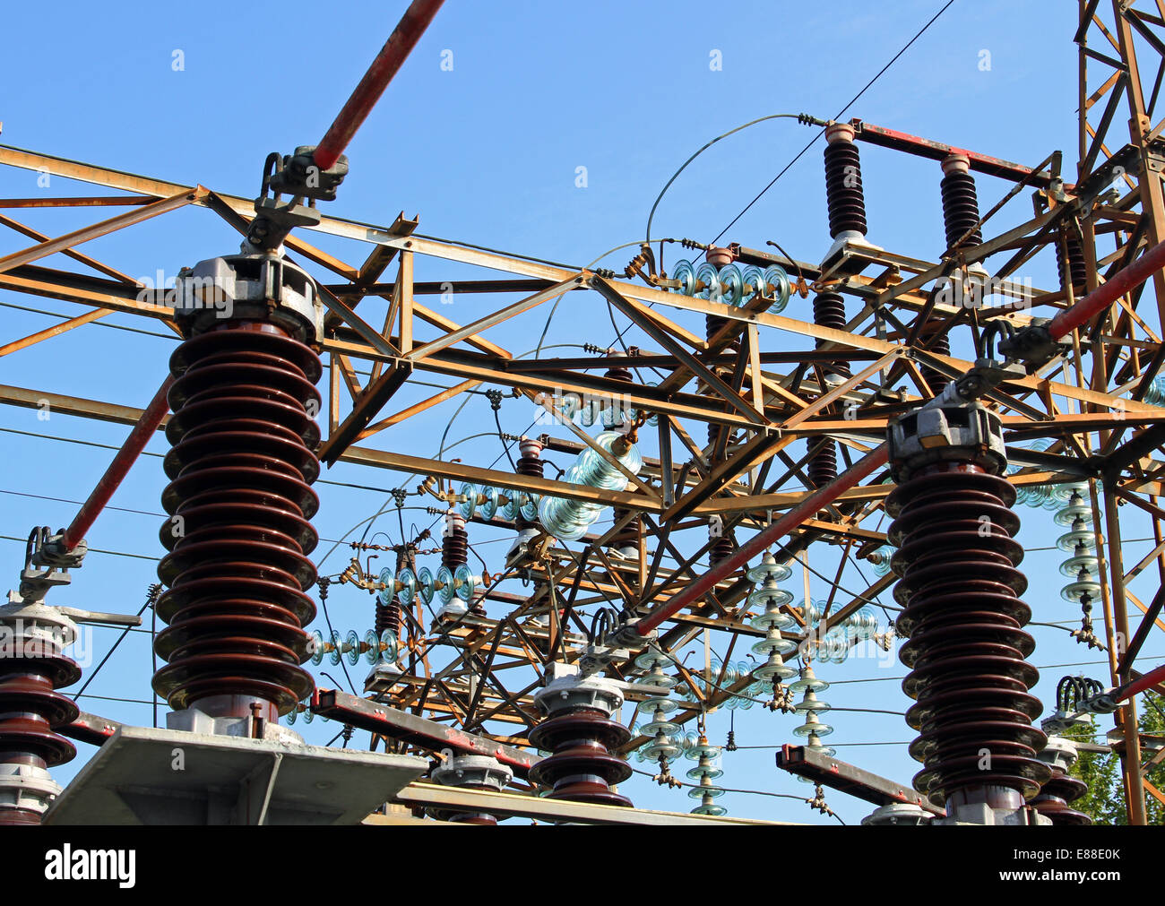 great insulators and electric cables in a large power plant Stock Photo ...