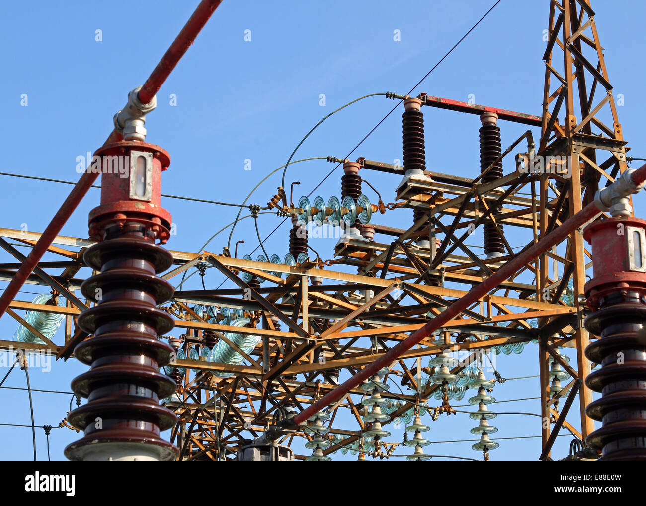 great insulators and electric cables in a large power plant Stock Photo ...