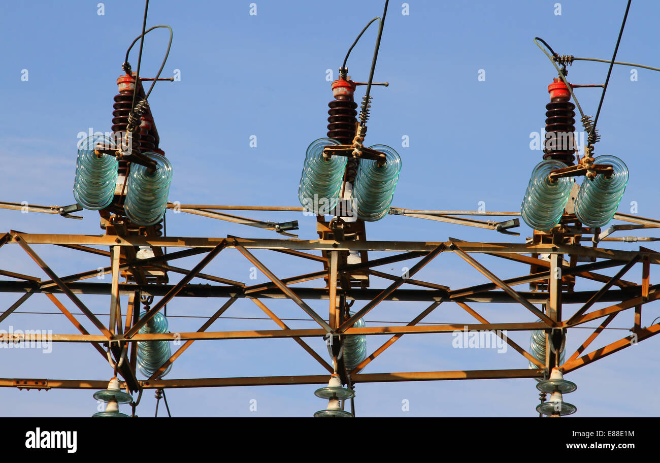 great insulators in a power plant with tall pylons of high voltage ...