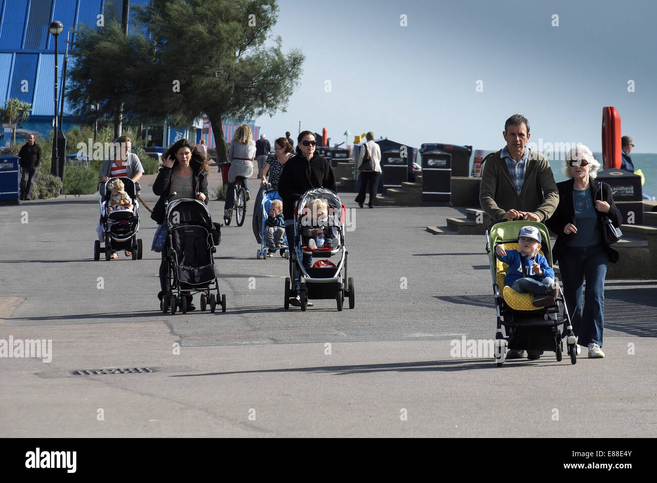 People pushing strollers along the seafront at Southend in Essex Stock ...