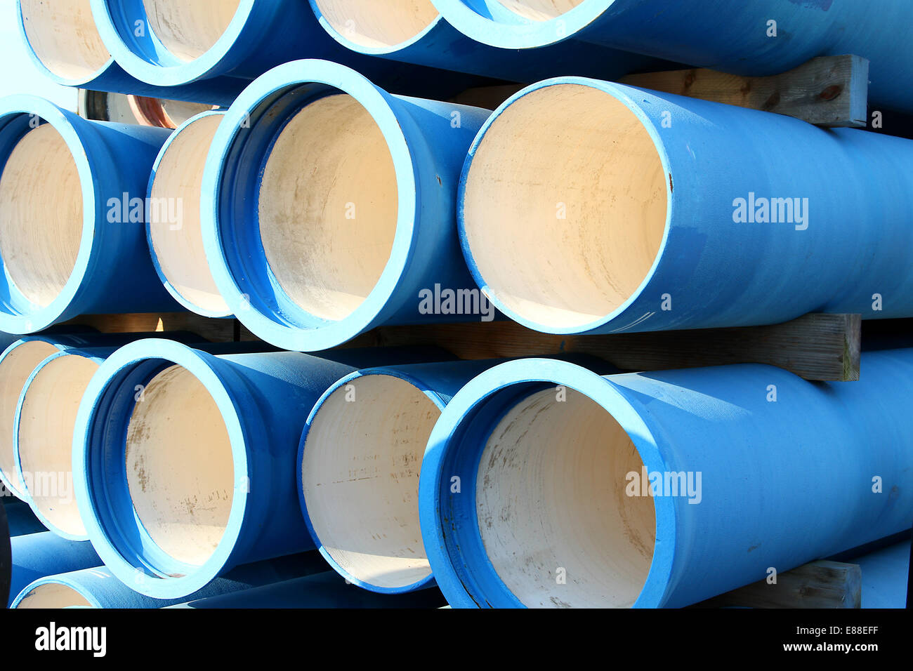 huge blue tubes for waterworks and sewer system of the city Stock Photo ...