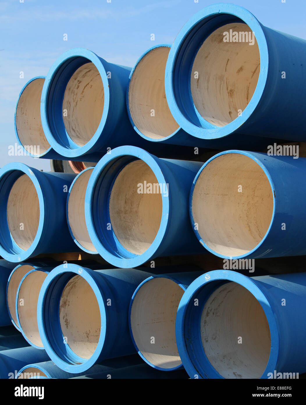 huge blue tubes for waterworks and sewer system of the city Stock Photo ...