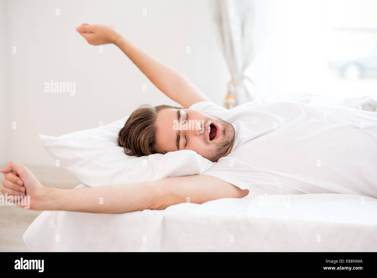 Adult human yawning hi-res stock photography and images - Alamy