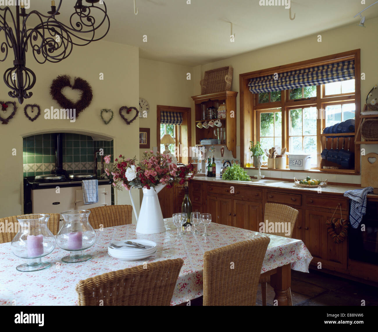 Blue and white checked blind on window above sink in country kitchen ...