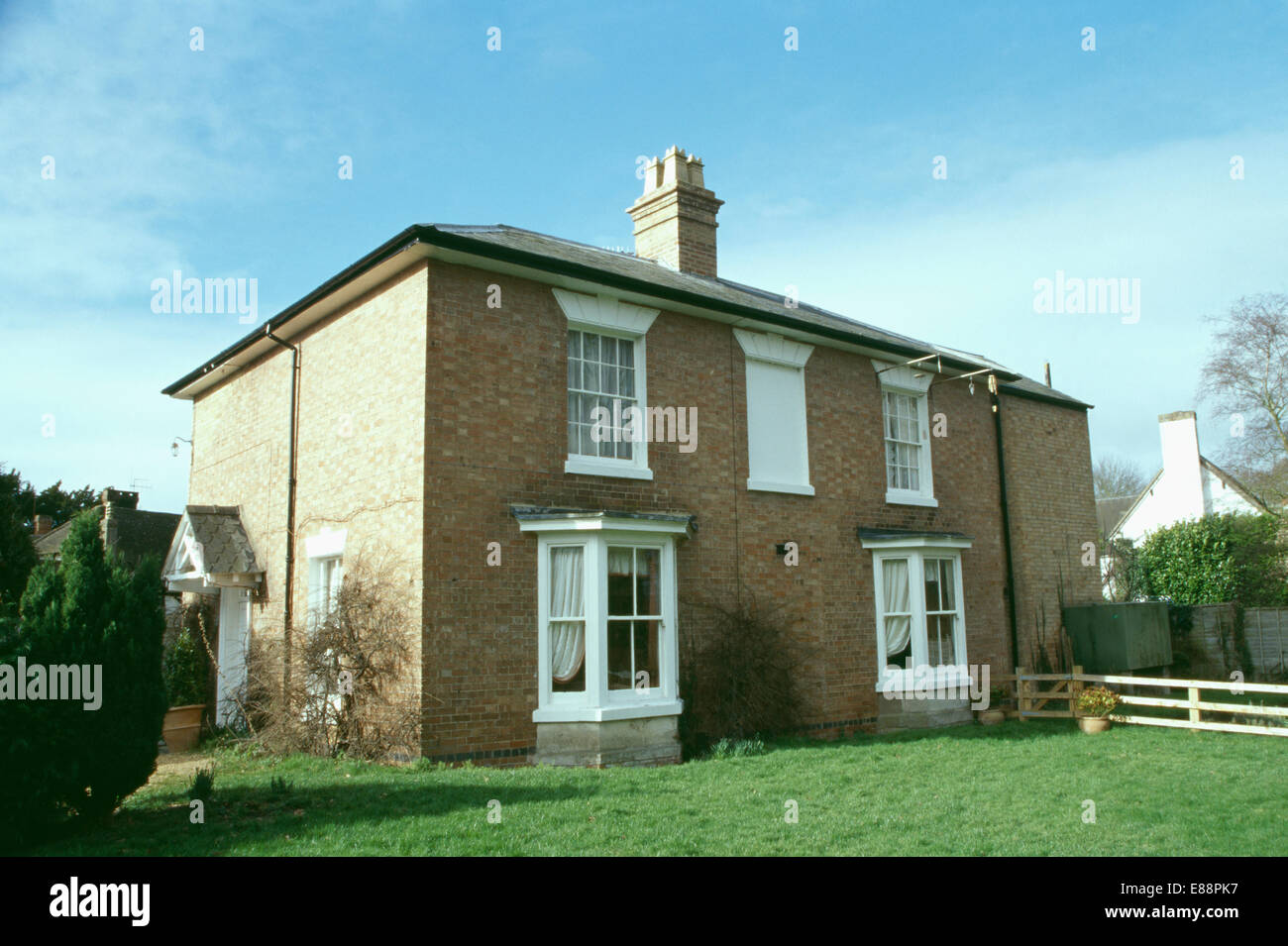 Traditional Victorian detached house in English village Stock Photo - Alamy
