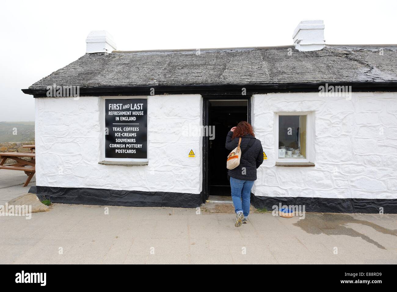 A tourist visitor walking into the first and last refreshment house in ...