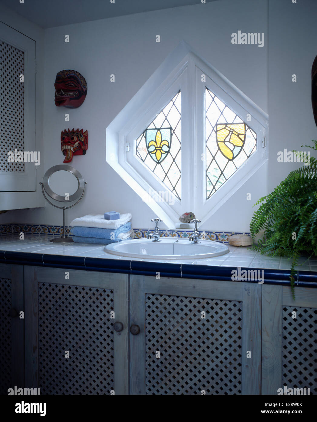 Blue stained glass window diamond hi-res stock photography and images ...