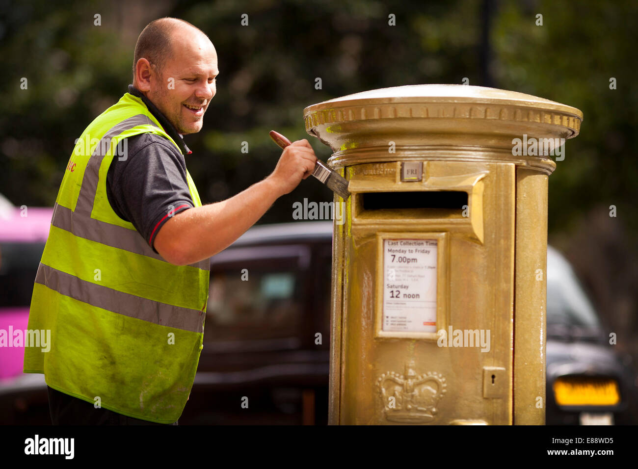 RED POST BOX IN MANCHESTER PAINTED GOLD BY ROYAL MAIL TO CELEBRATE ...