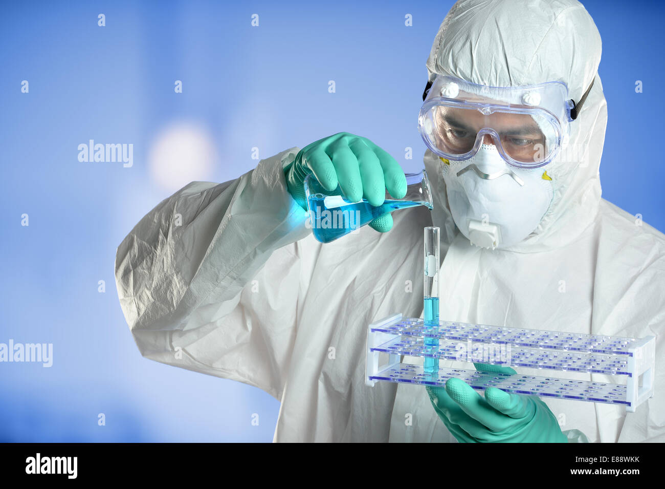 Scientist in protective suit working in laboratory Stock Photo - Alamy