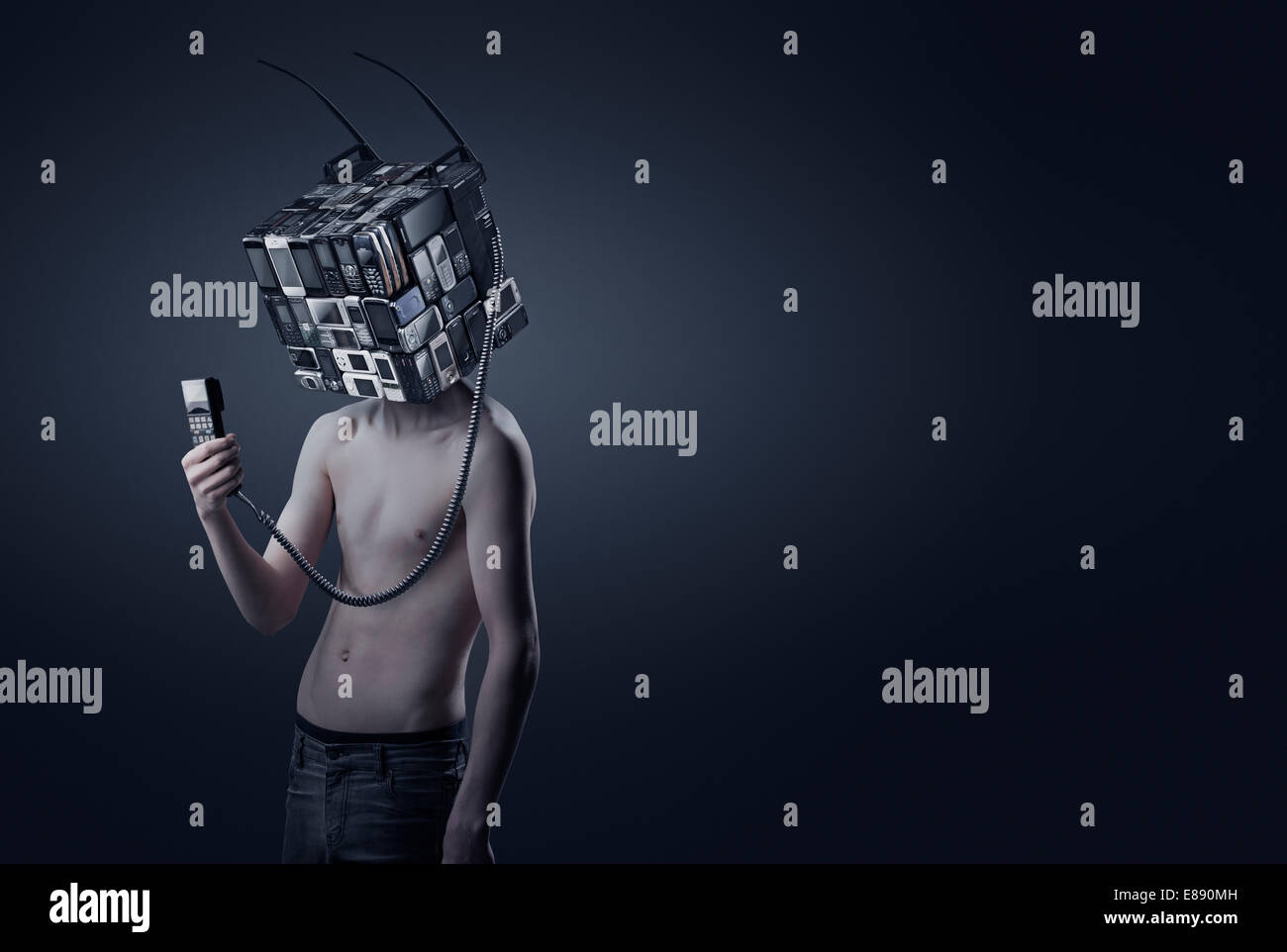 Man with a cube head made from mobile phones Stock Photo - Alamy