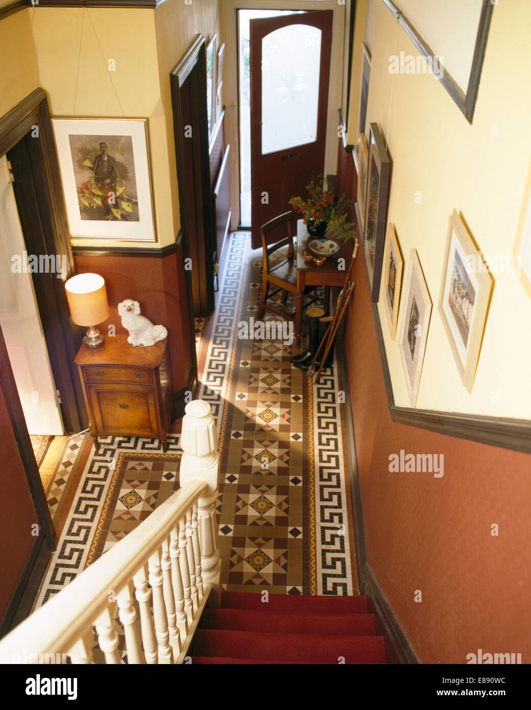 Looking down staircase of townhouse hall with original Edwardian ...
