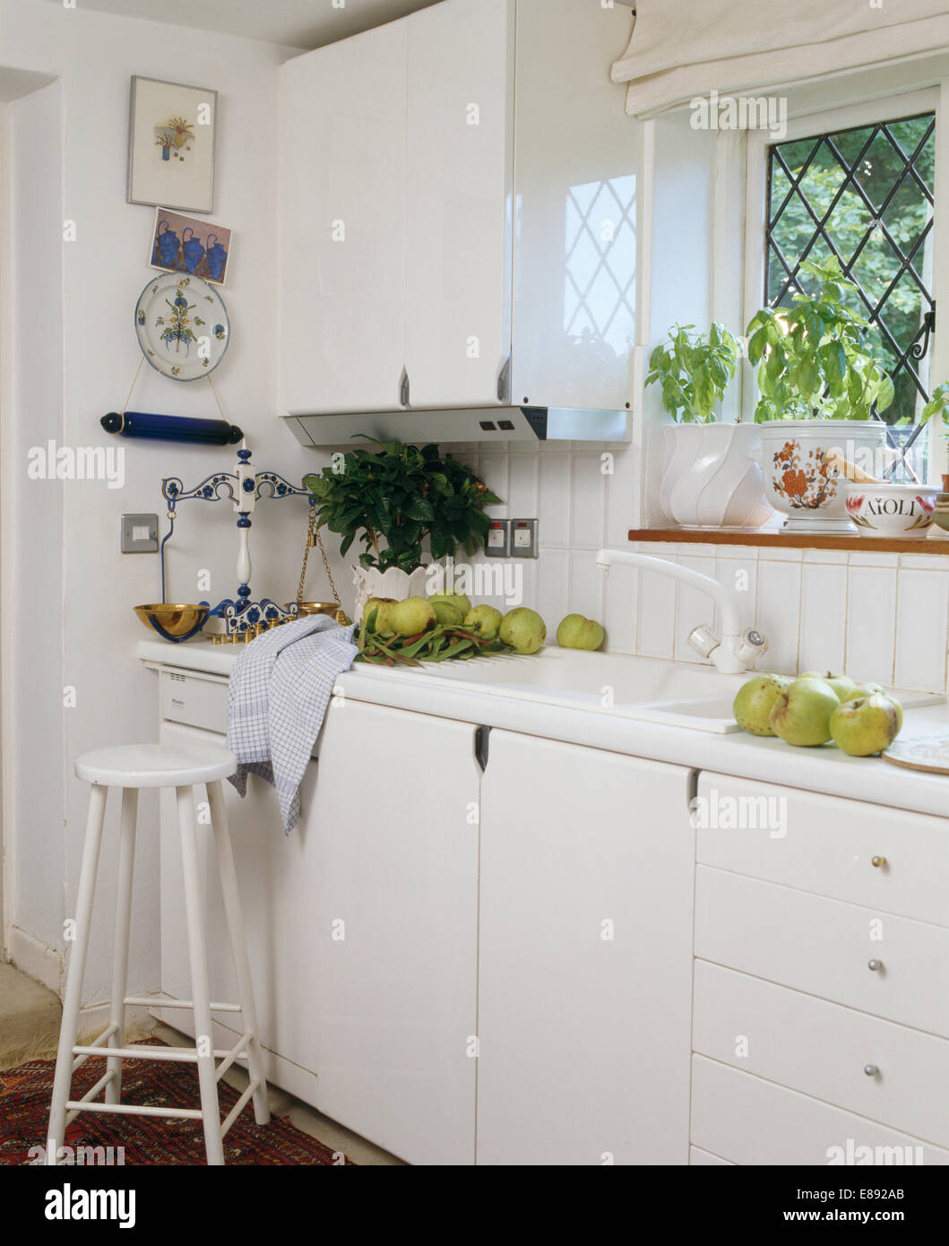 White stool beside sink in small hi-res stock photography and images ...
