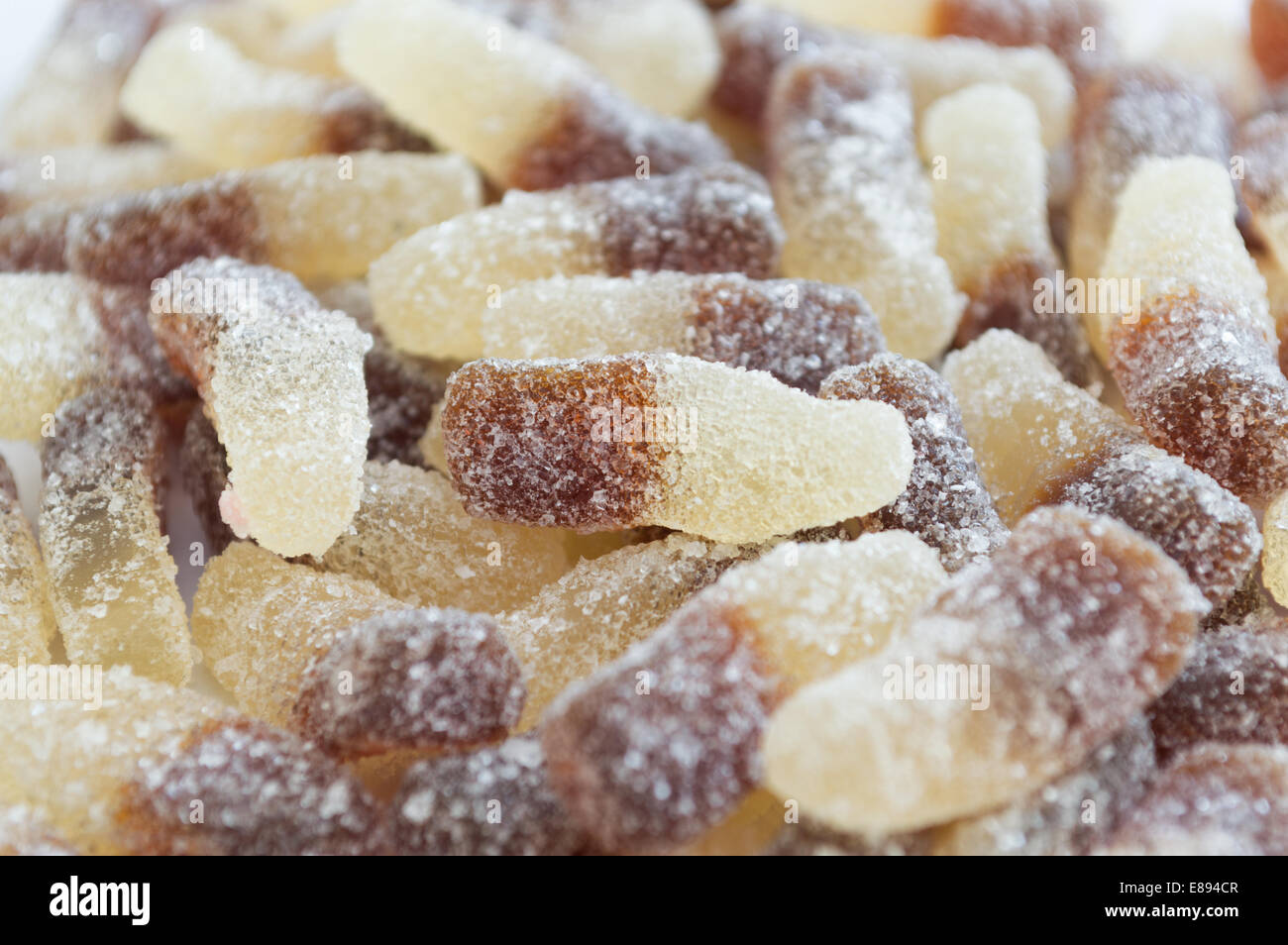 chewy sugary sweets - fizzy cola candy Stock Photo - Alamy
