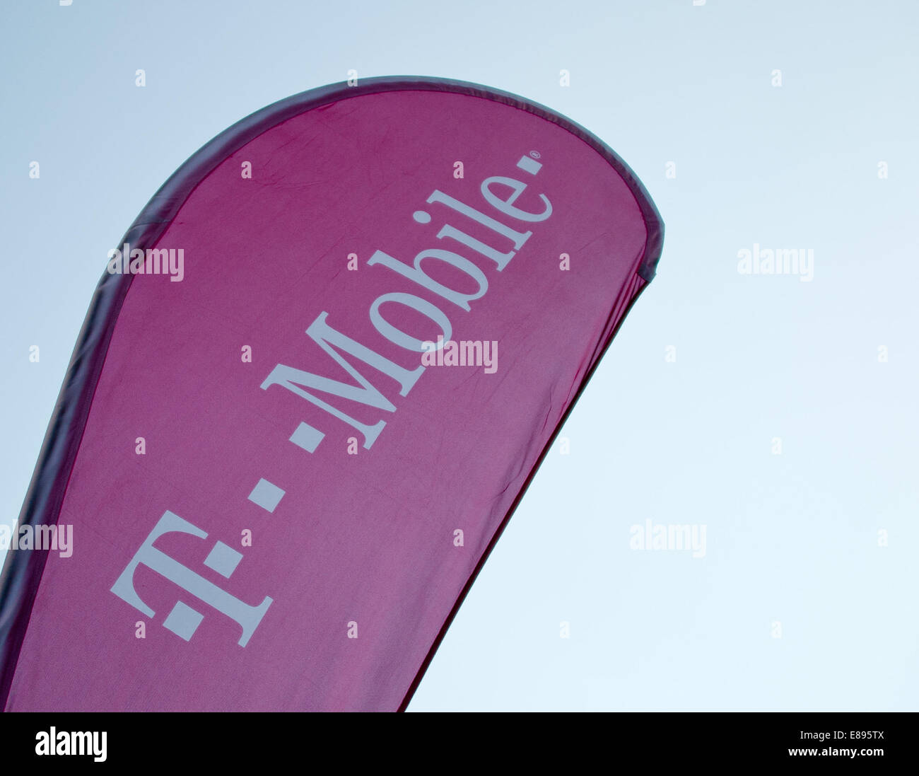 An advertising banner for the cellular phone company T-Mobile in New ...