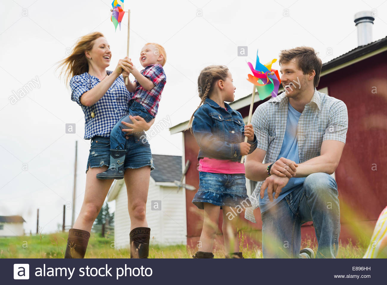Three Children Holding High Resolution Stock Photography and Images - Alamy