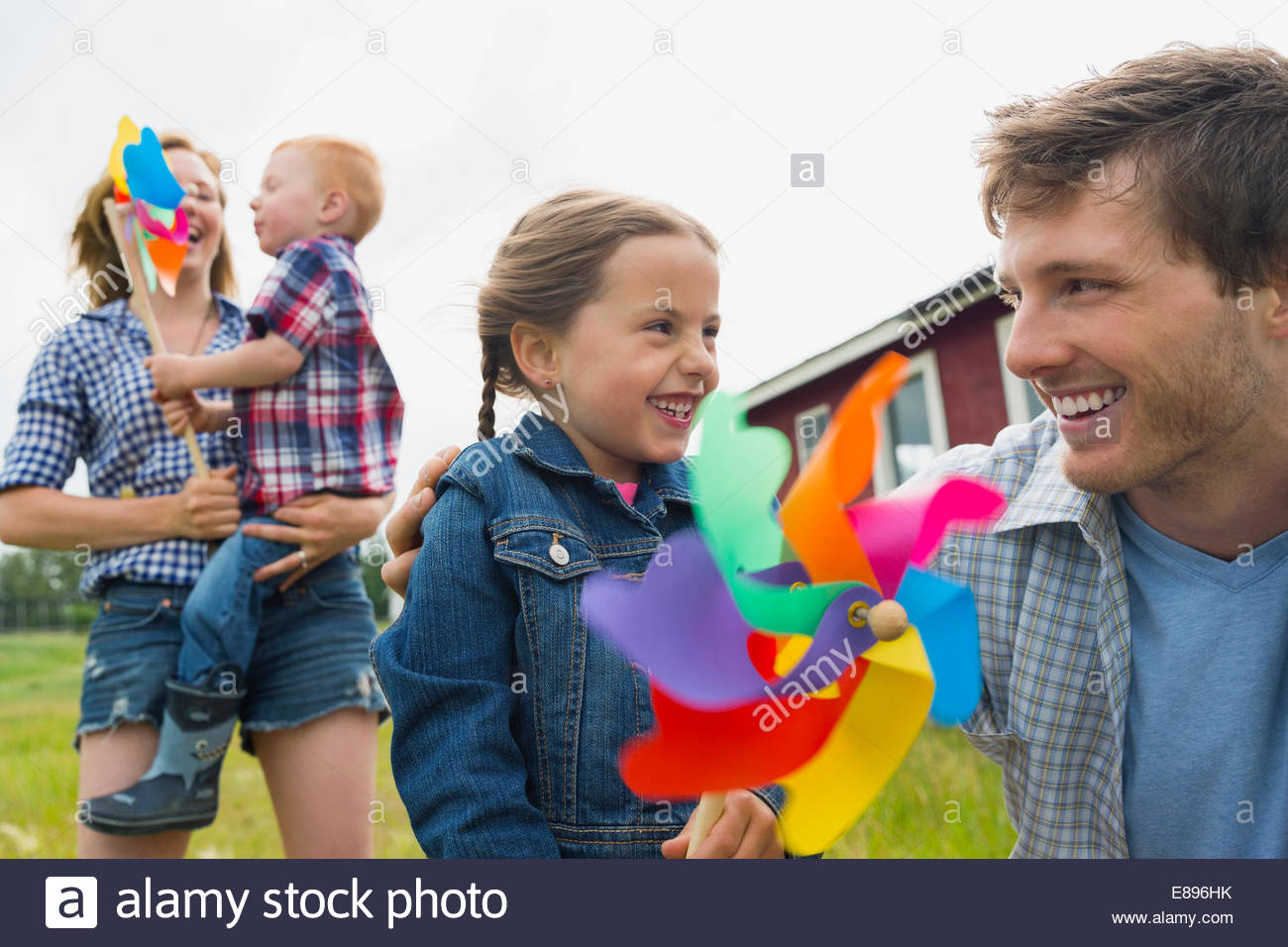 Outdoors children parents shoulders hi-res stock photography and images ...