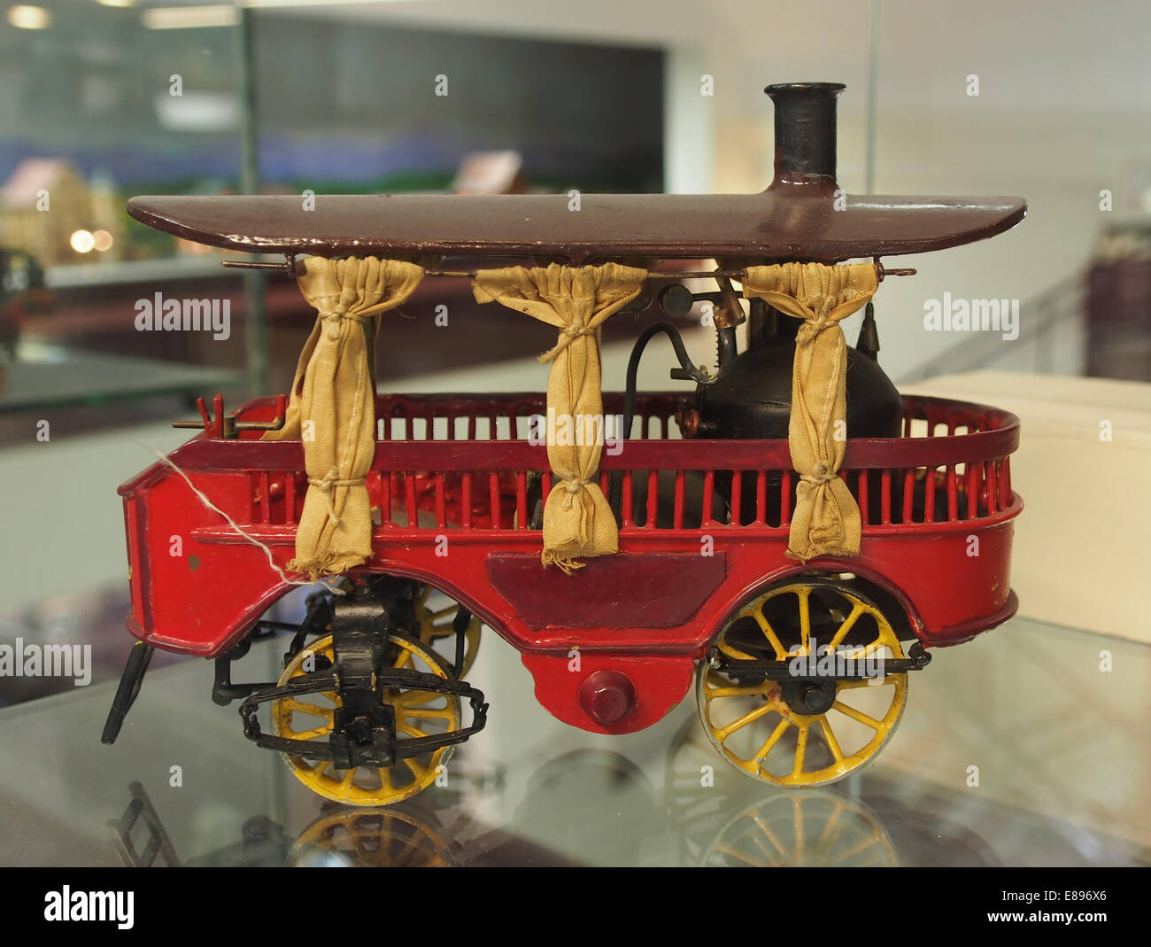 An antique model of a steam engine, displayed at the Musée du Jouet de ...