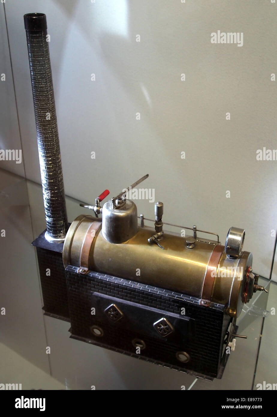 A toy steam engine displayed at the Musée du Jouet de Colmar. This ...