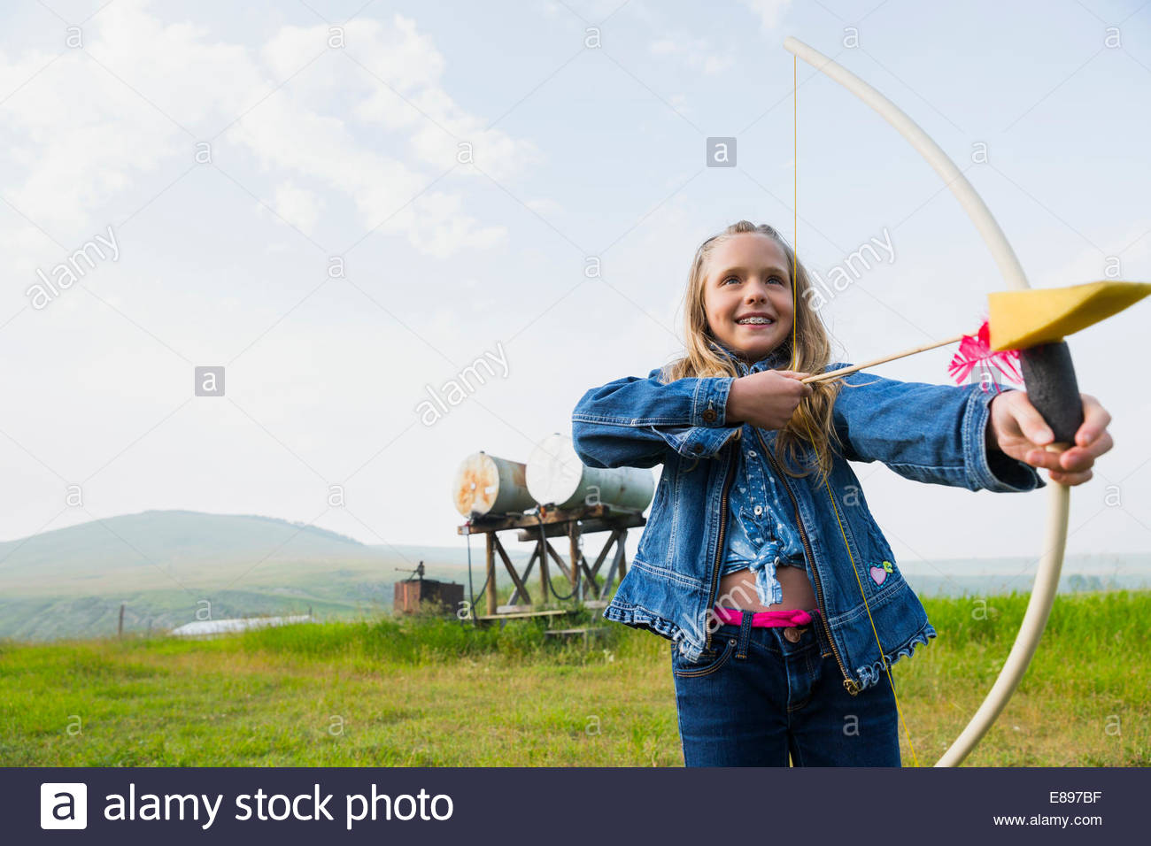 Girl with bow in hair hi-res stock photography and images - Alamy