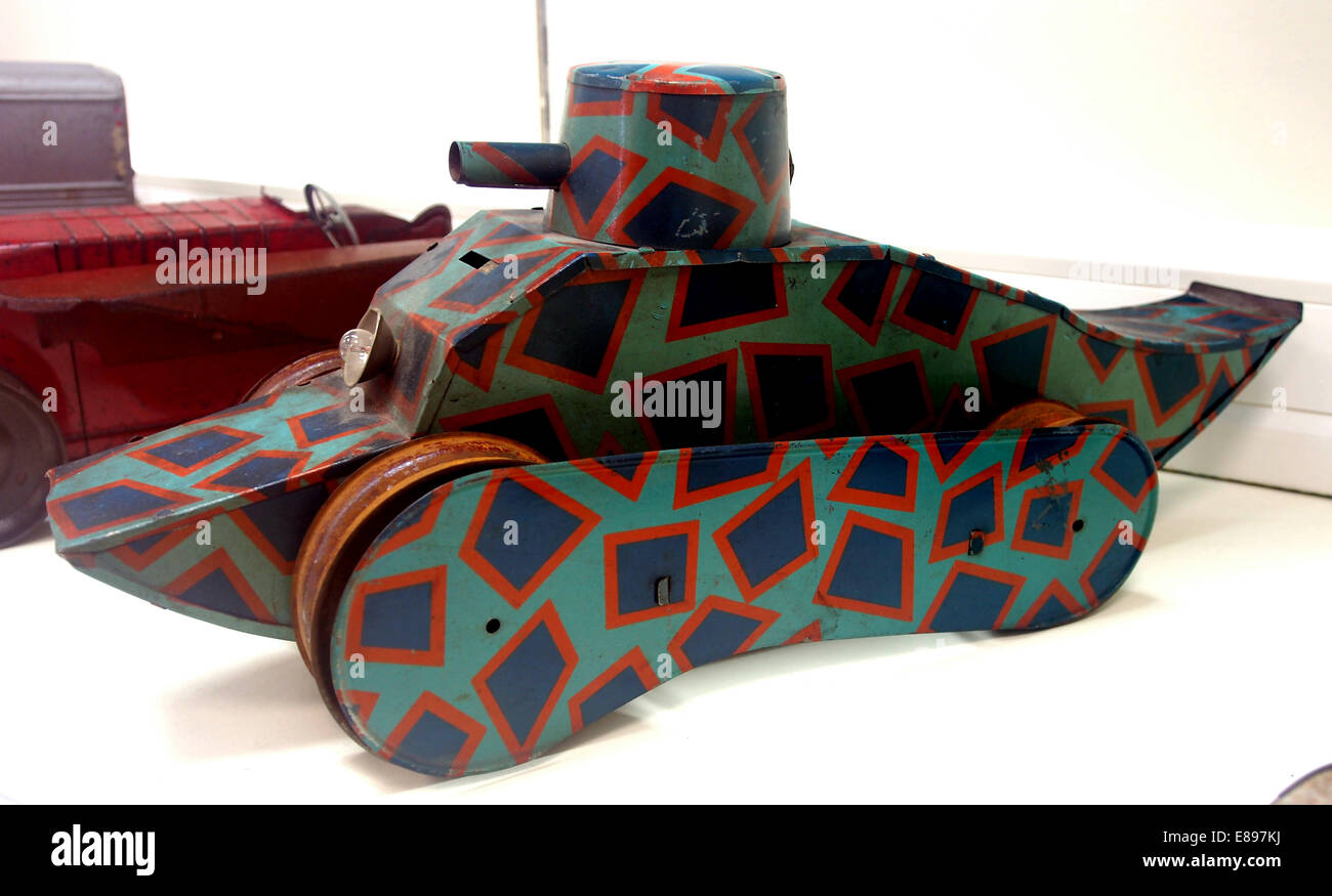 This vintage World War I tin toy tank showcases historical toy ...